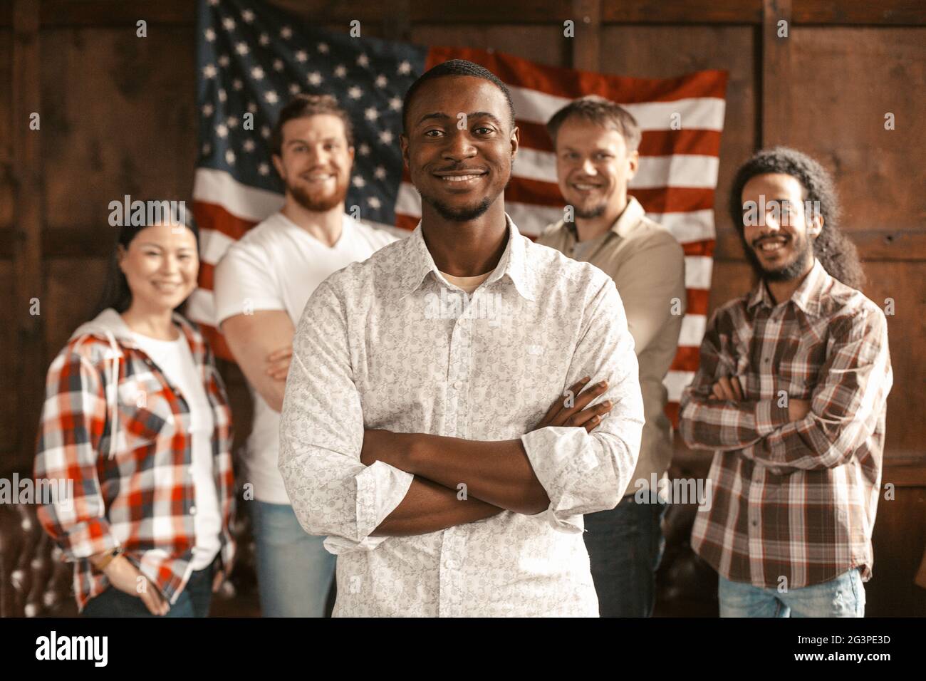 Diverse American Patriotic Team Standing On Of American's Flag Back ...