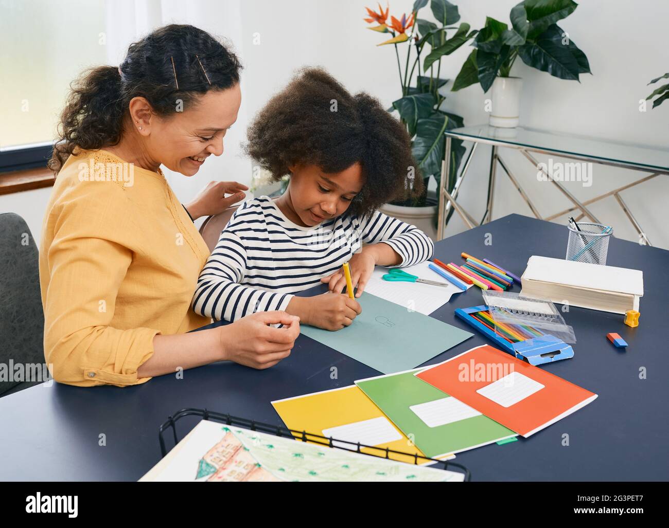 African American girl with autistic disorder with child's psychologist ...