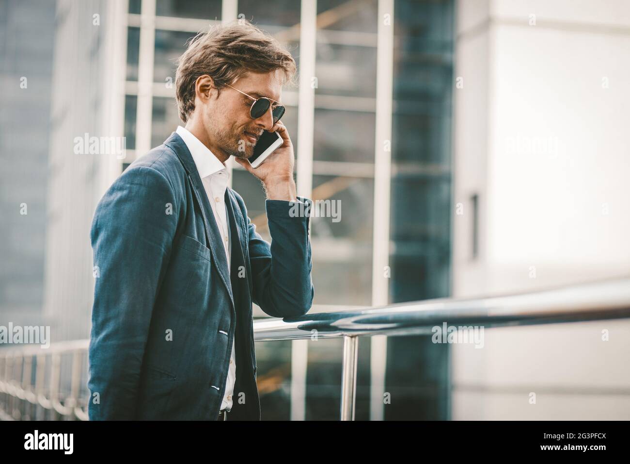 Happy professional guy talking hi-res stock photography and images - Alamy