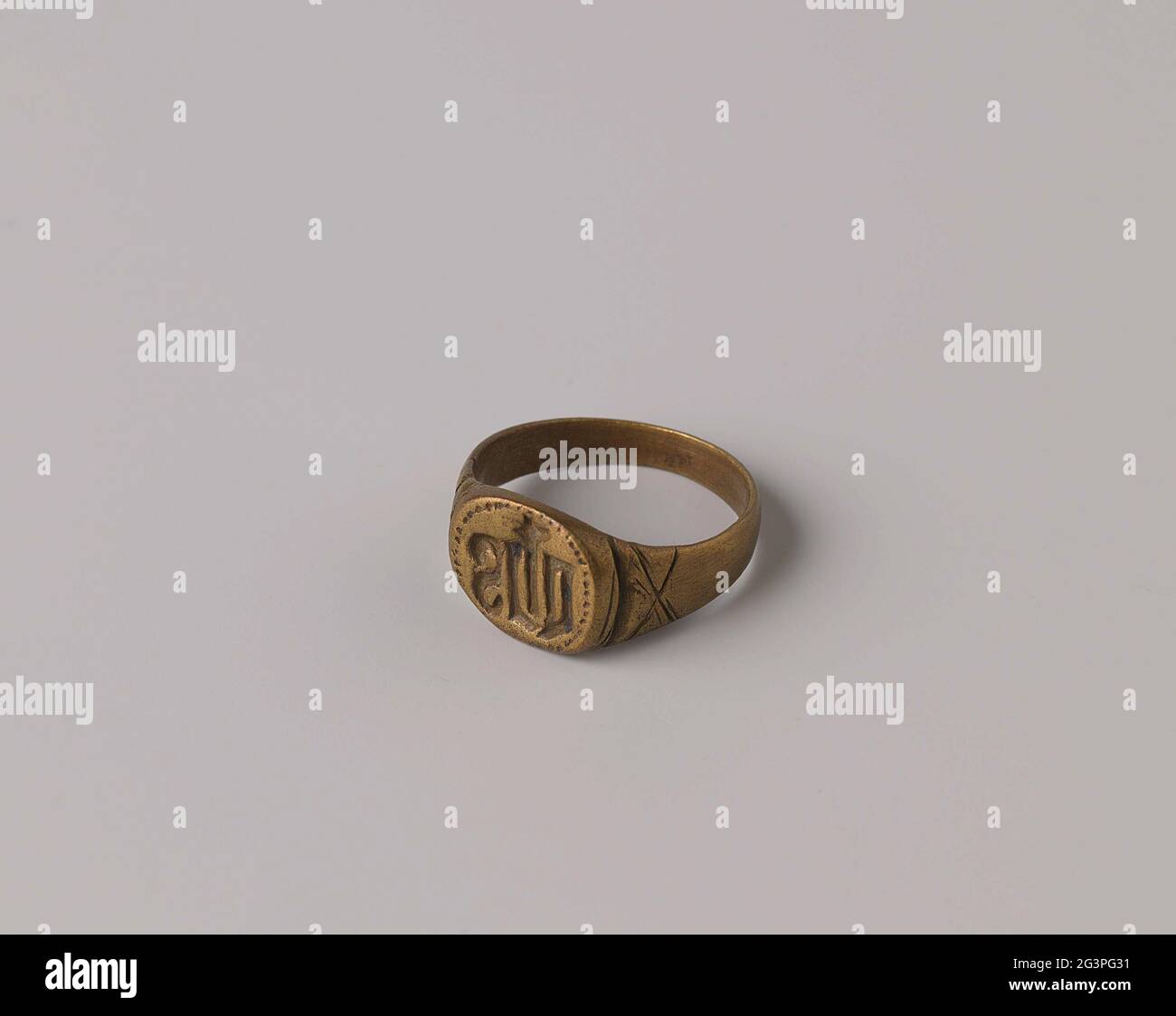Signet ring with gothic letters. Ring with oval seal stamp where in a ...