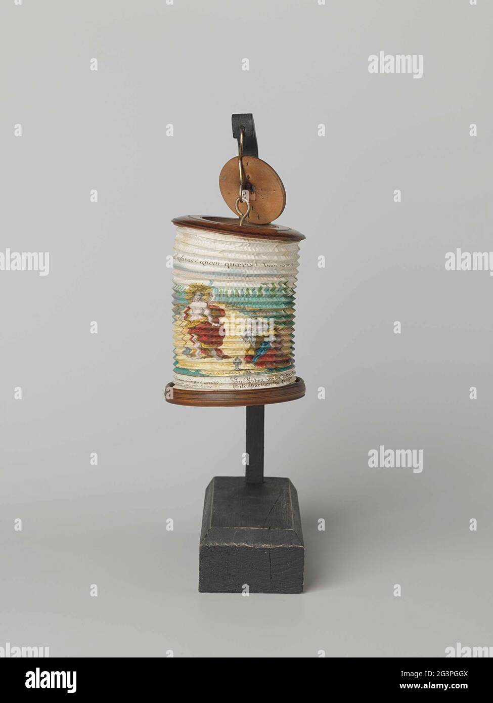Lantern. Lantern with a twisted wooden top and top plate, with a ...