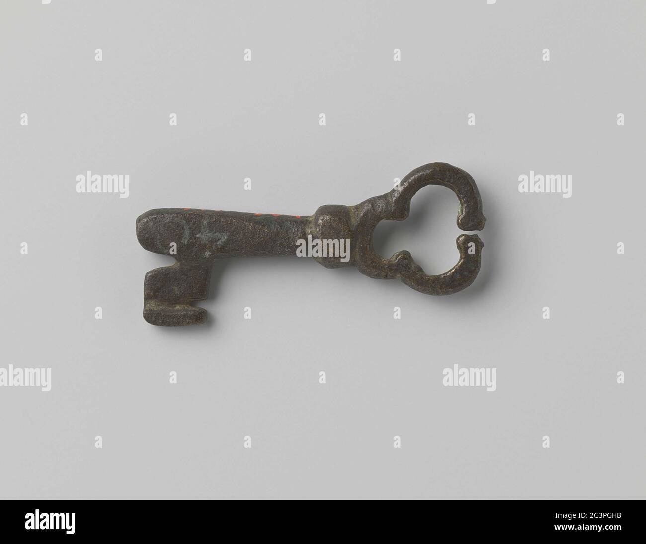 Key. Three-pass-shaped key on a ball-shaped capital that is placed ...