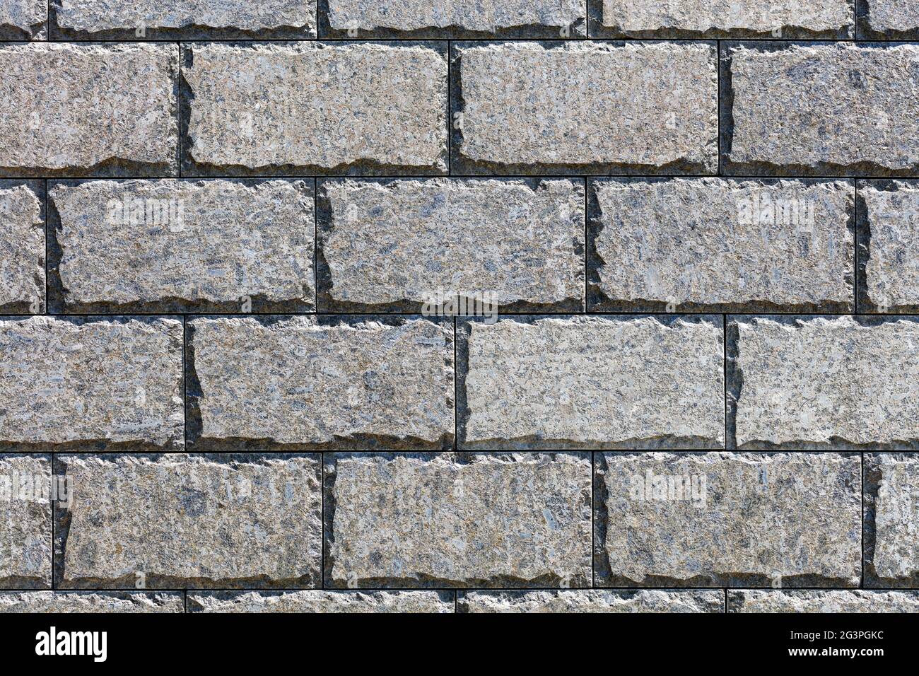 The beautiful texture of the wall is lined with polished stone tiles ...