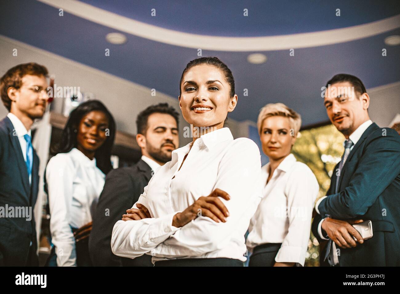 Business Lady Smiles Standing In Front Of Colleagues's Group Stock ...