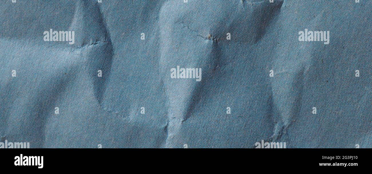 Wide blue crinkled paper texture background Stock Photo - Alamy