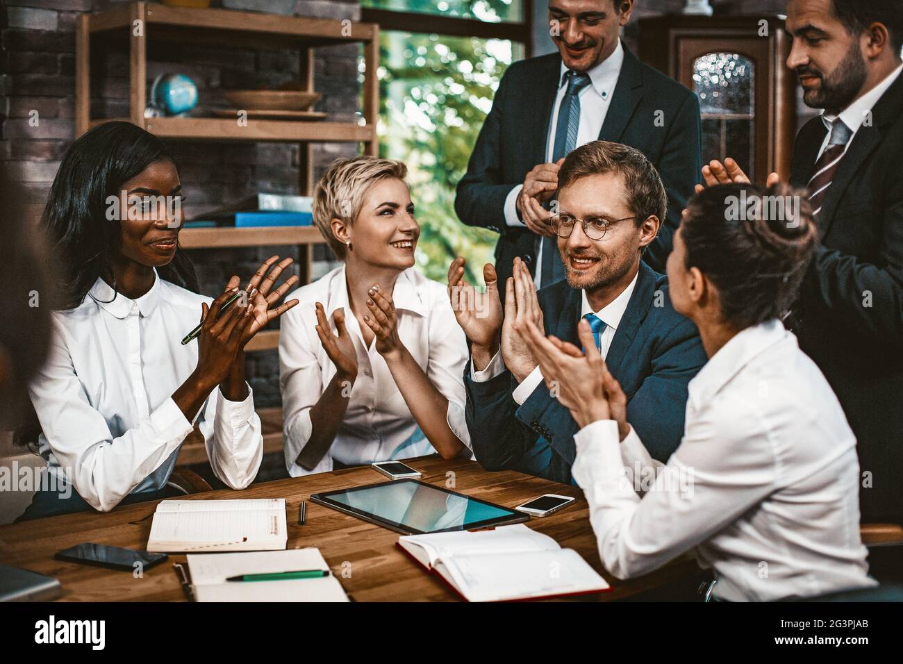 Applause Of Friendly Diverse Business Group At Meeting Stock Photo - Alamy