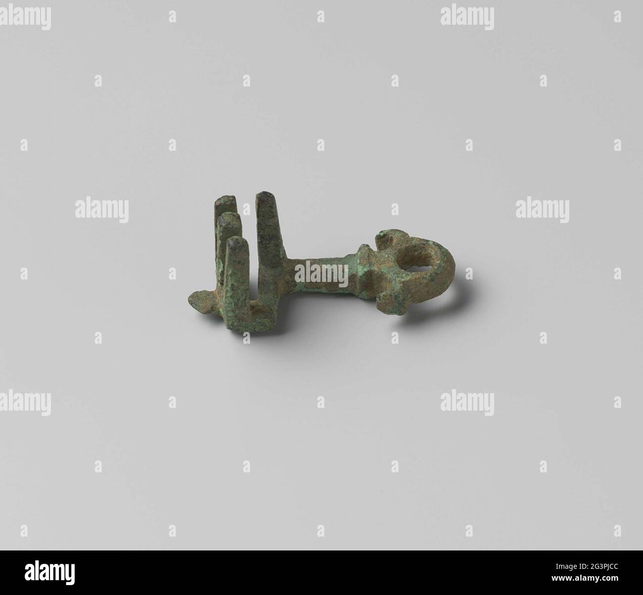 Key. Key whose round eye is provided on either side of two hooks. There ...