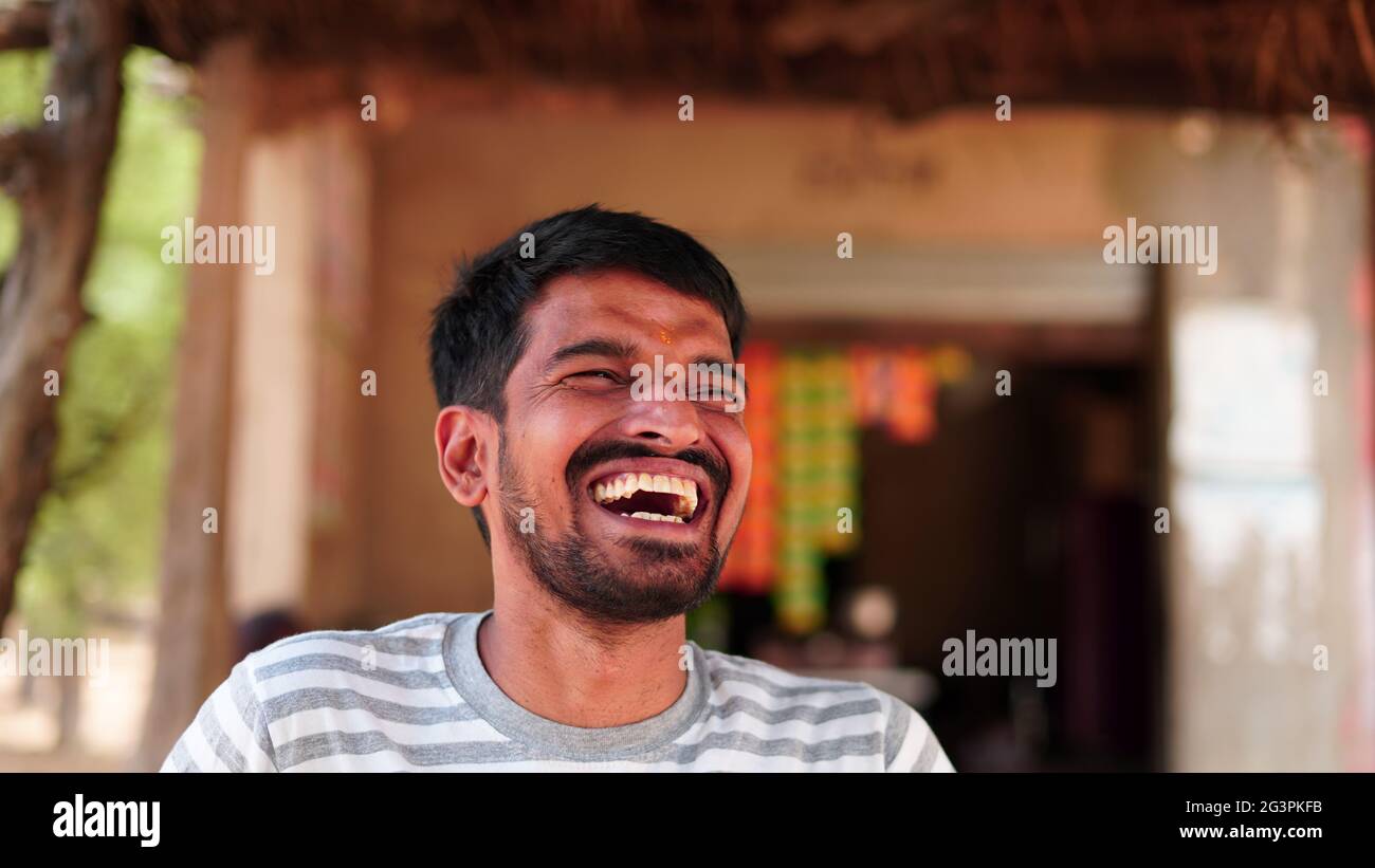 Indian boy laughing hi-res stock photography and images - Alamy