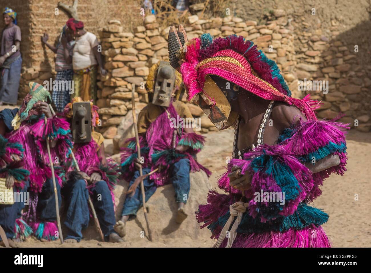 Dogon dancers performing the Dama ritual dance wearing Kanaga masks ...