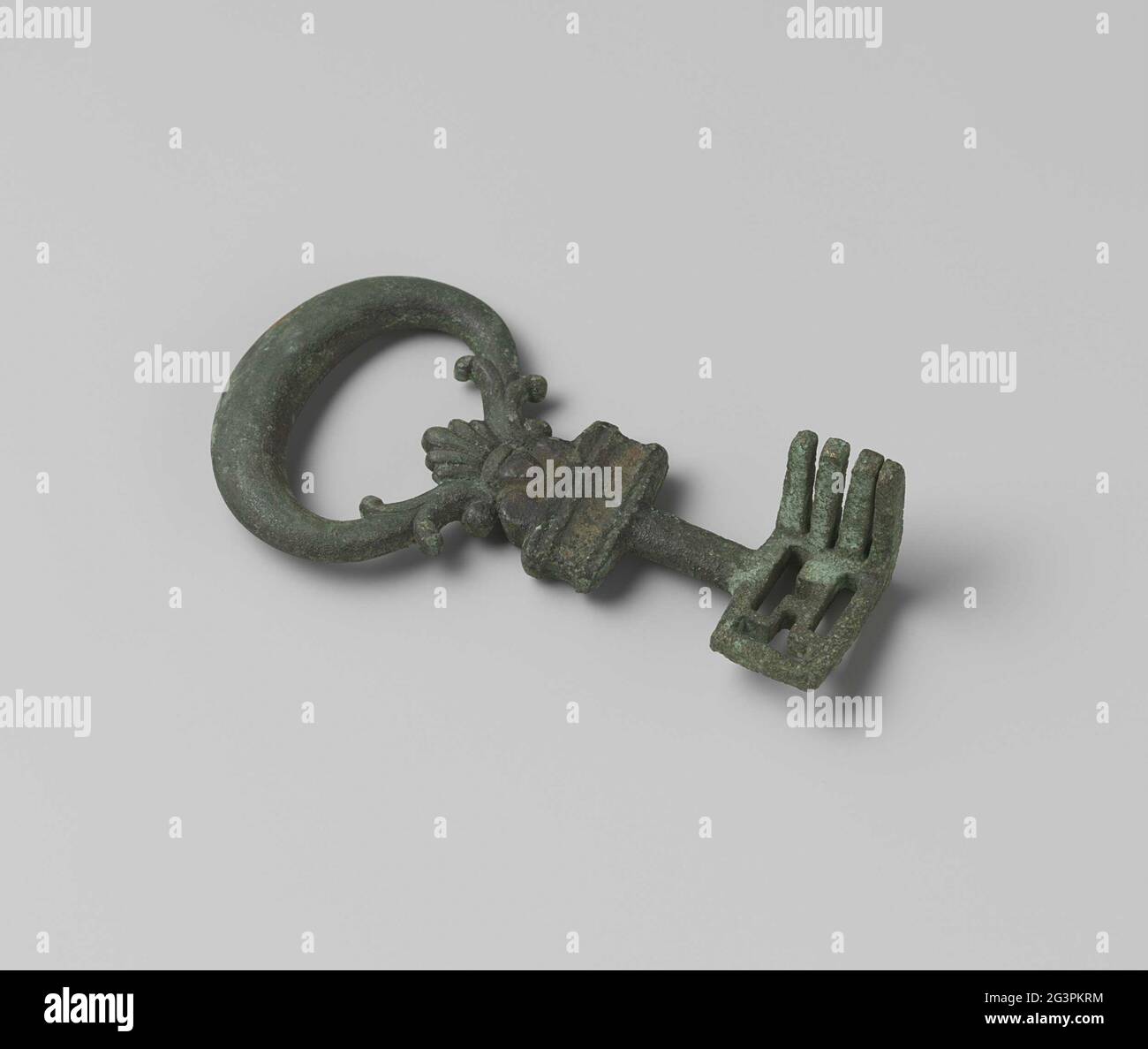 Key. Key with bracket-shaped eye, a small palmet decoration below. The ...