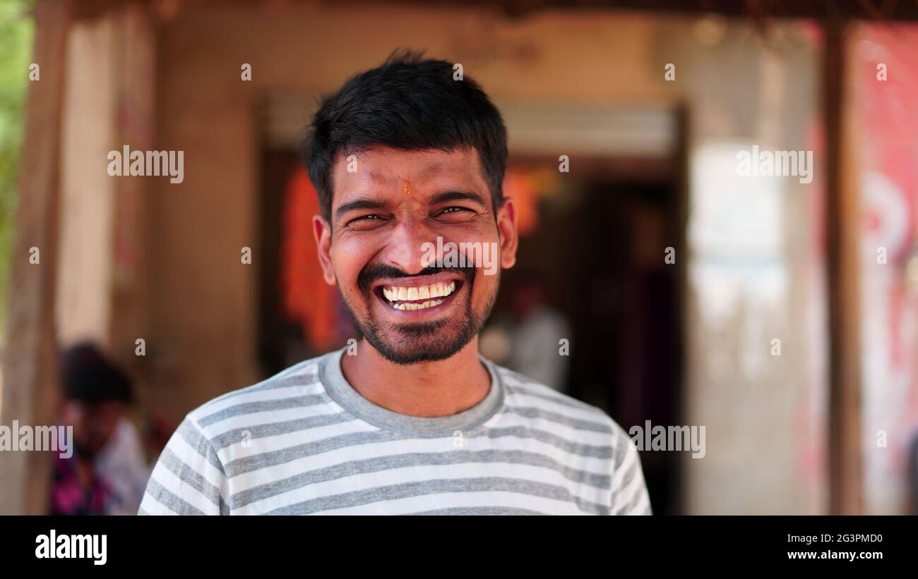 Positive person. Young handsome Asian man with beard wearing casual ...