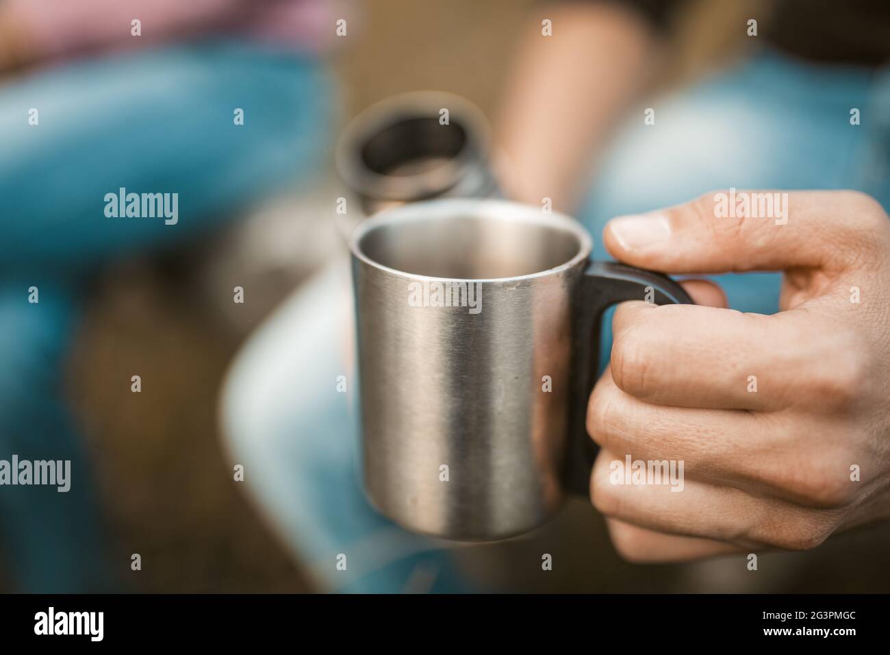 Hand holding cup hi-res stock photography and images - Alamy