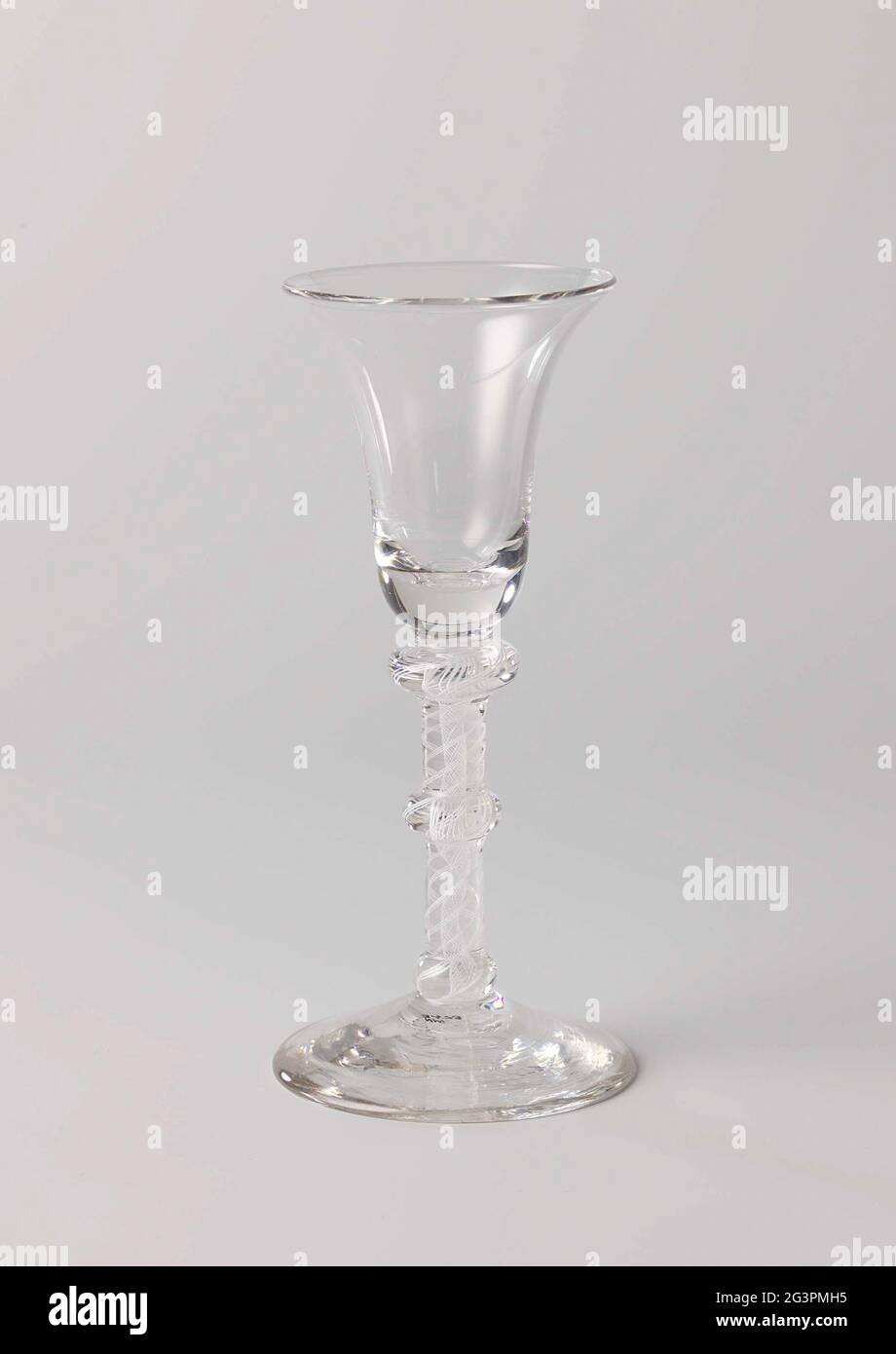 Slinger glass with bell-shaped chalice. Slinger glass with conical foot ...