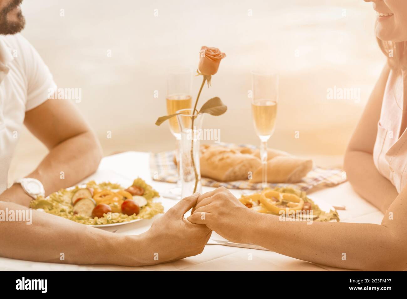 Portrait of loving couple on dinner dating on white backdrop ...