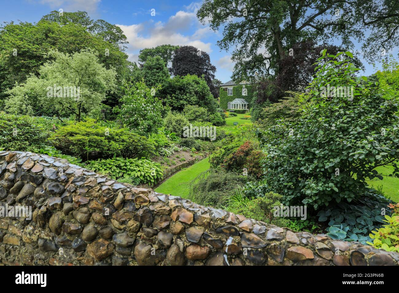 A flint Stone bridge in the grounds of Bressingham Gardens, a steam ...
