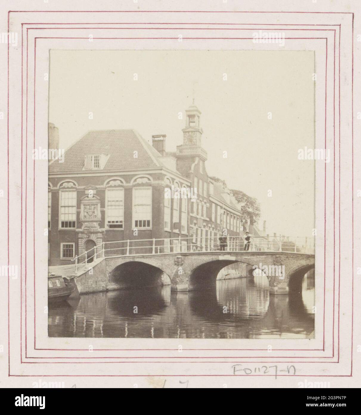Bridge and the old woman and children's house at the Spui in The Hague ...