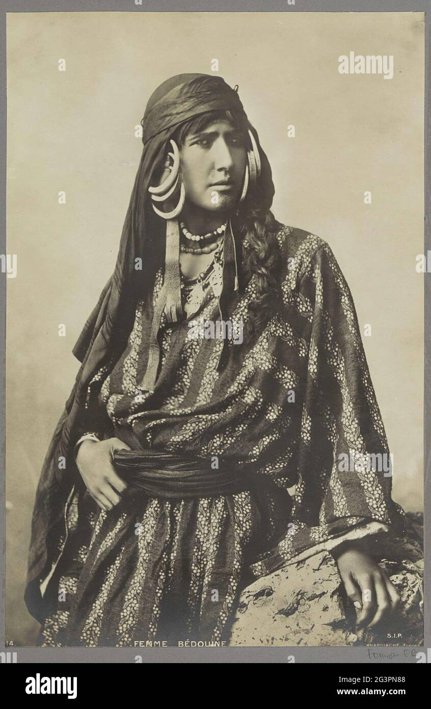 Portrait of a Bedouin woman standing; Femme Bédouine. Part of travel ...