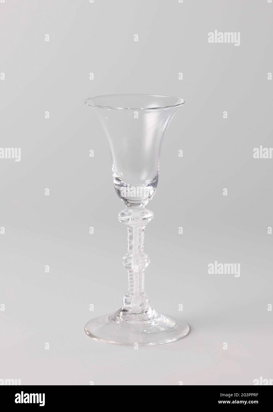 Slinger glass with bell-shaped chalice. Slinger glass with conical foot ...