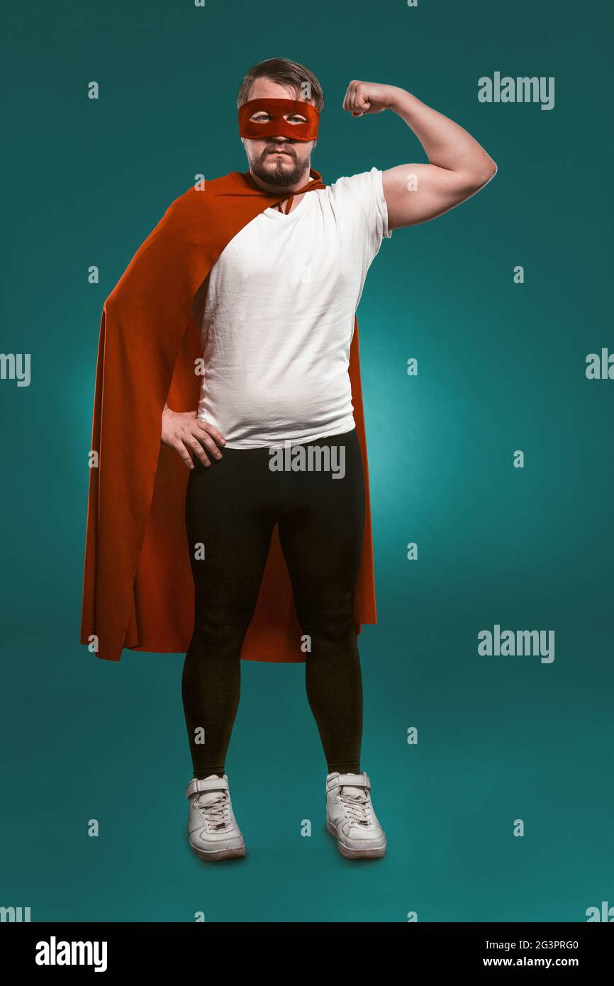 Super Hero Man Shows His Muscles And Ready To Save World. Serious Man ...