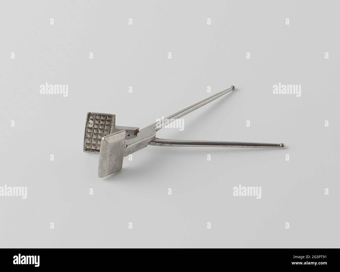 Waffle iron with round stem with button. Iron wafer iron; Round stem ...