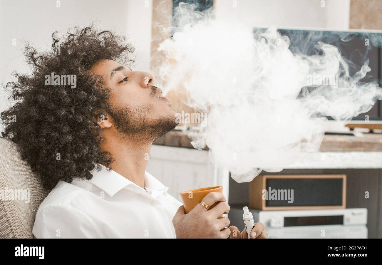 Handsome smoker hi-res stock photography and images - Alamy