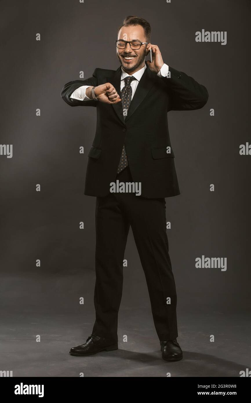 Young man full height with phone hi-res stock photography and images ...