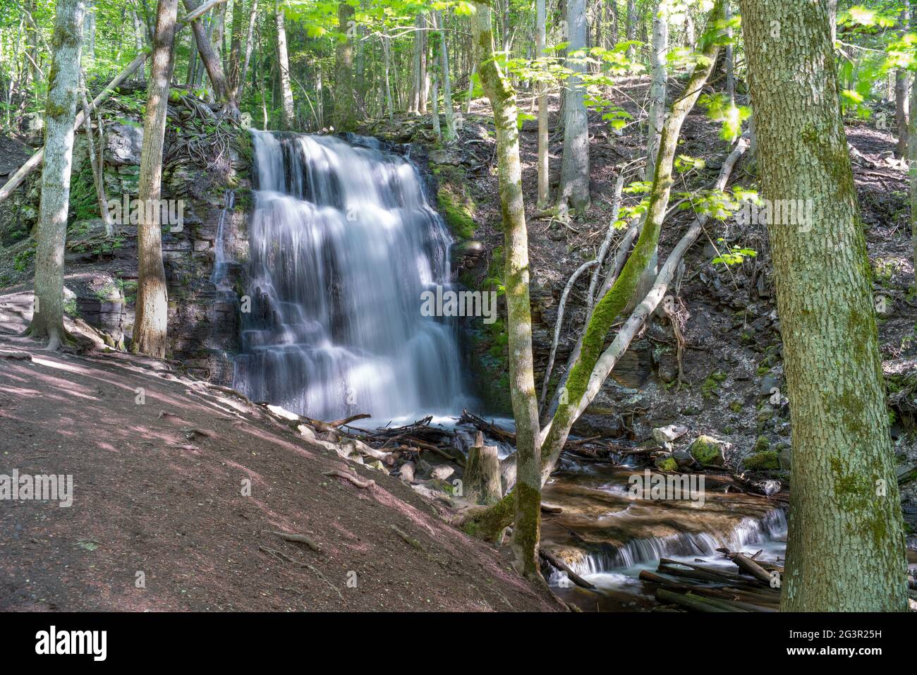 Silverfallet Staircase Waterfall illuminated by low rays of sun Stock ...