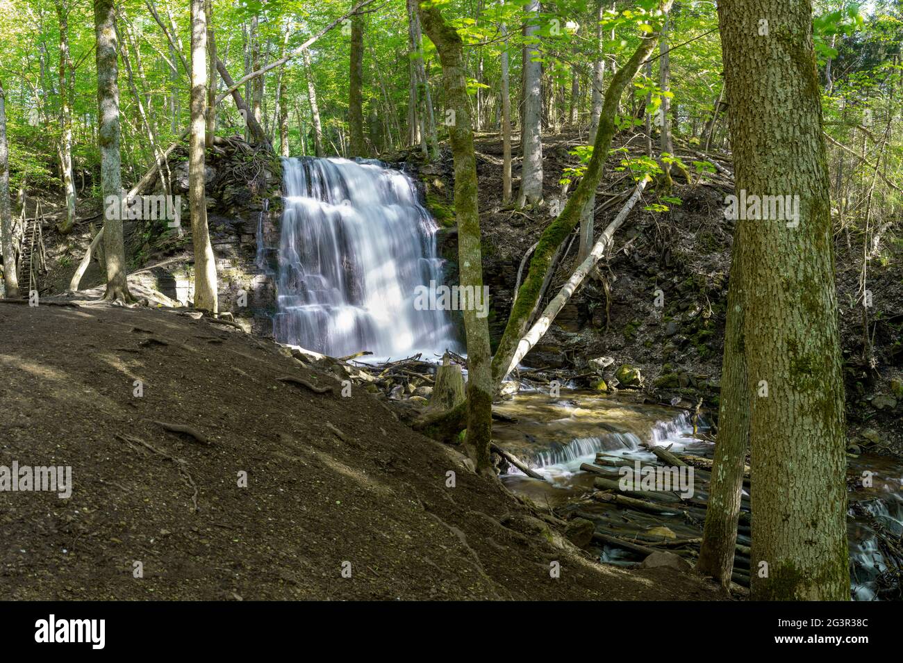 Silverfallet Staircase Waterfall illuminated by low rays of sun Stock ...