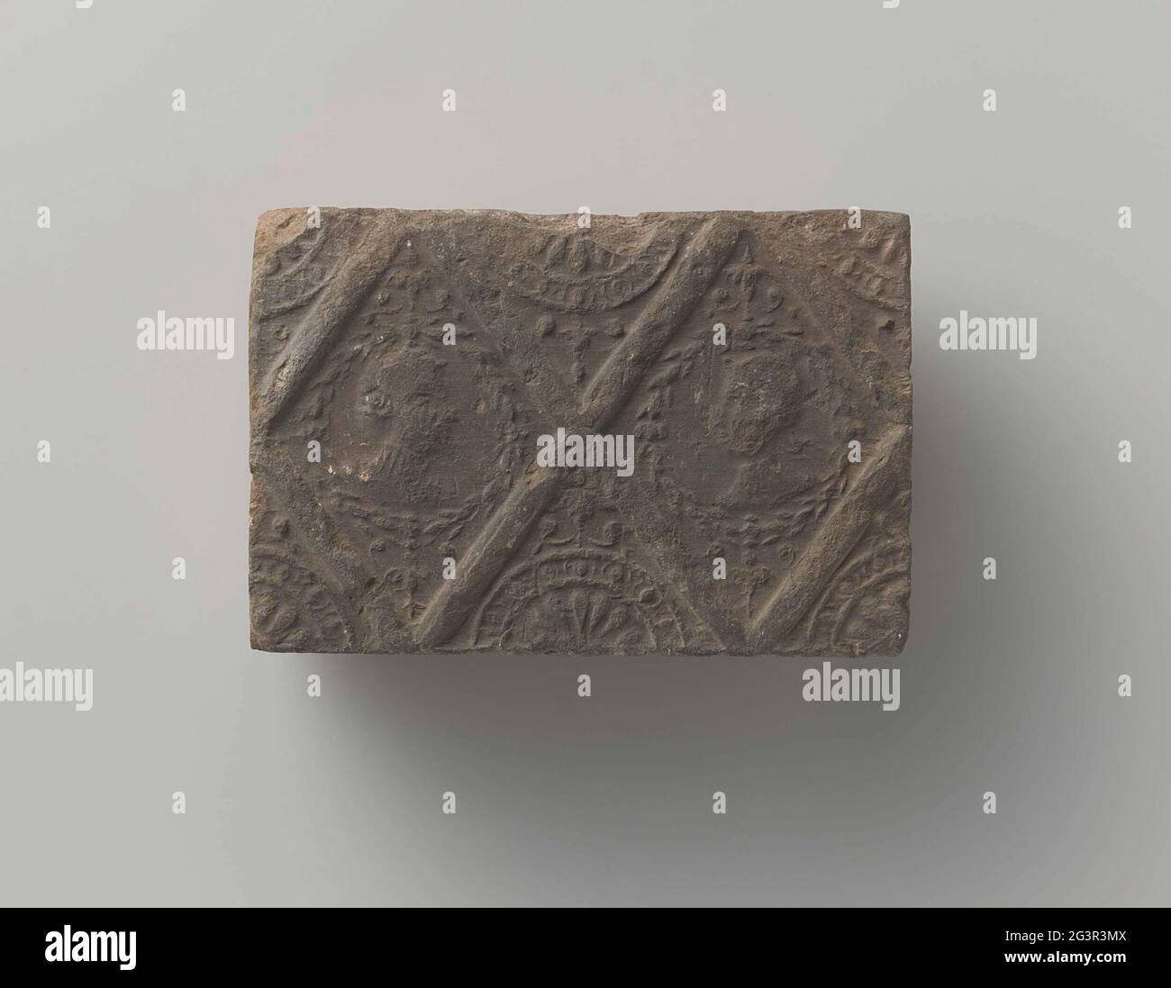 Fireplace of baked earth with diamond-shaped distribution. Fireplace of ...