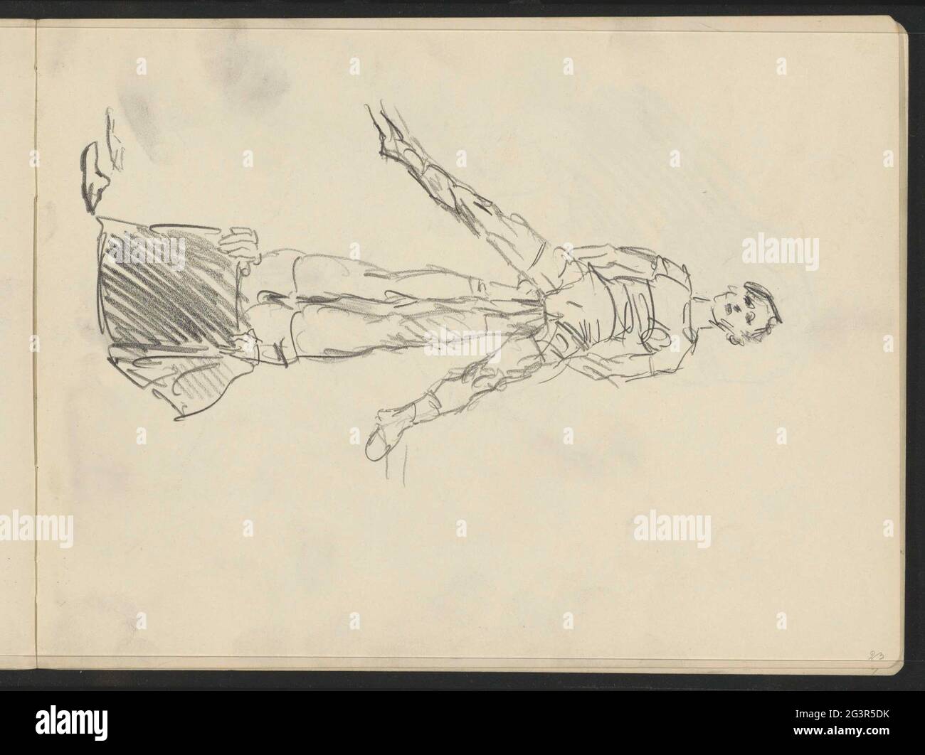 Two acrobats. An acrobat is sitting with spread legs on the feet of an ...