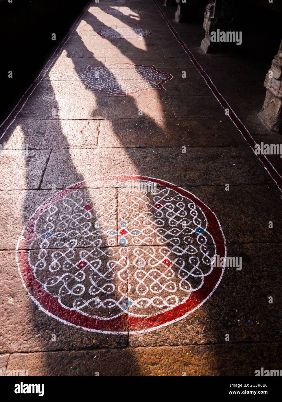 Of temple pillars falling on the stone floors of the ancient Hindu ...