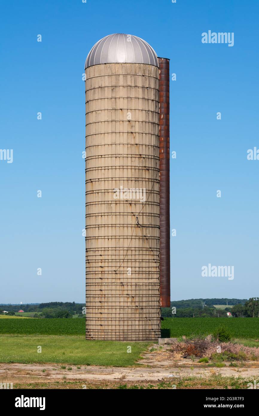 Farm silo in open field on a beautiful sunny morning. Lee County ...