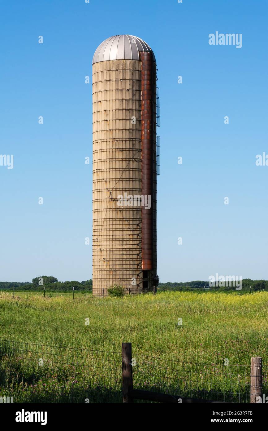 Farm silo in open field on a beautiful sunny morning. Lee County ...