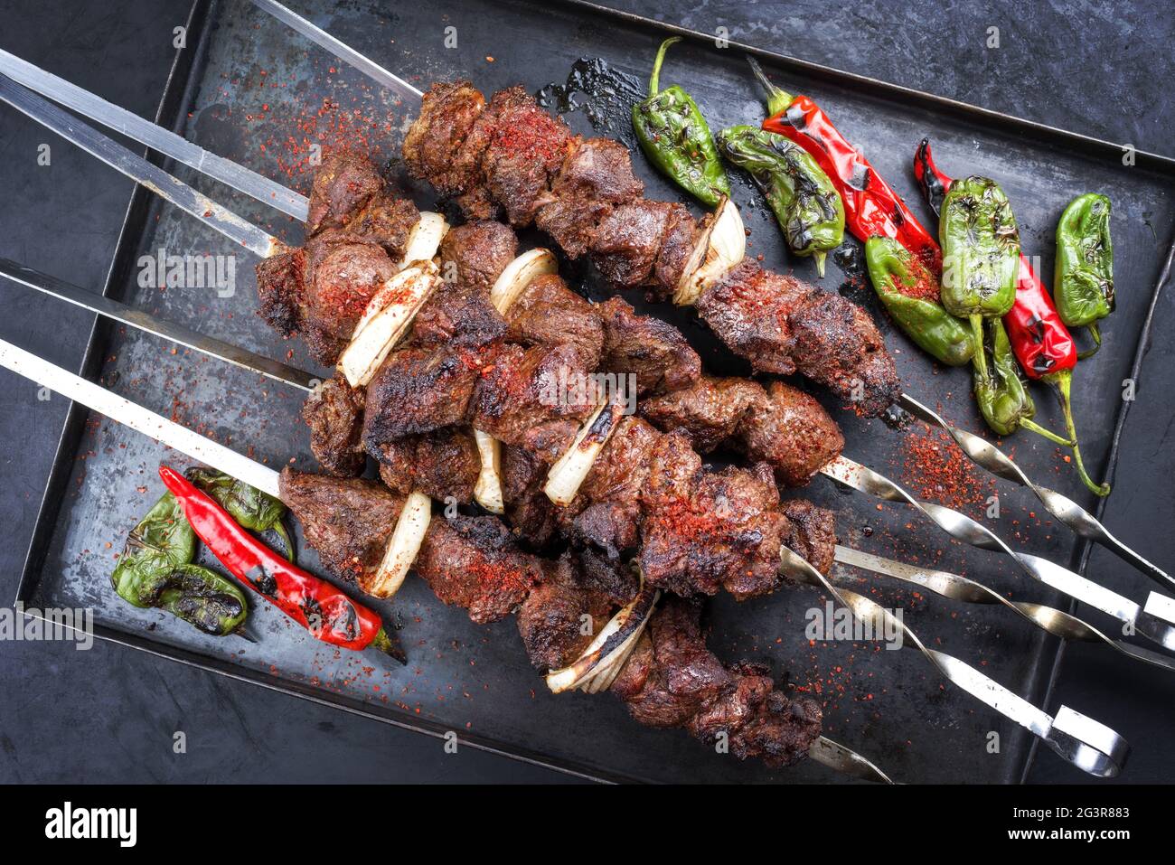Traditional Russian lamb shashlik on a barbecue skewer with chili Stock ...