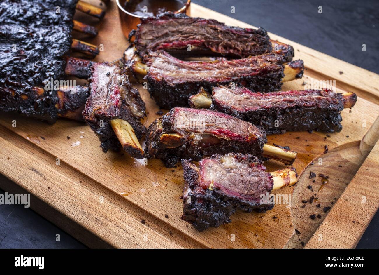 Traditional Barbecue burnt beef ribs St Louis style sliced and offered ...