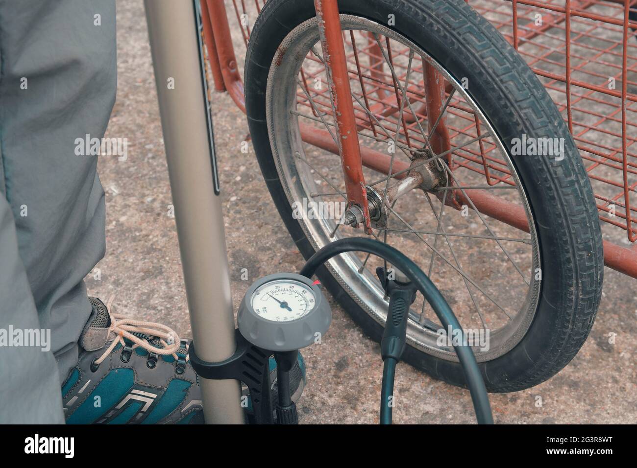 Pumping air into carriage wheel. The air pumping system in the wheel ...