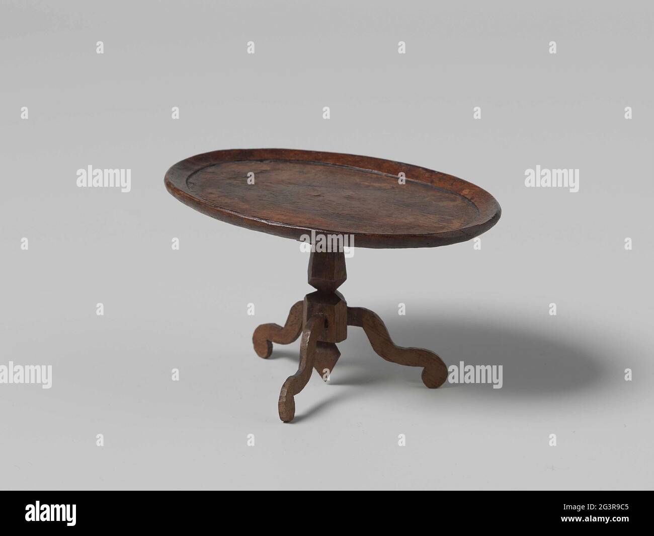 Table with oval leaf, on hexagonal baluster trunk. Oval table of ...