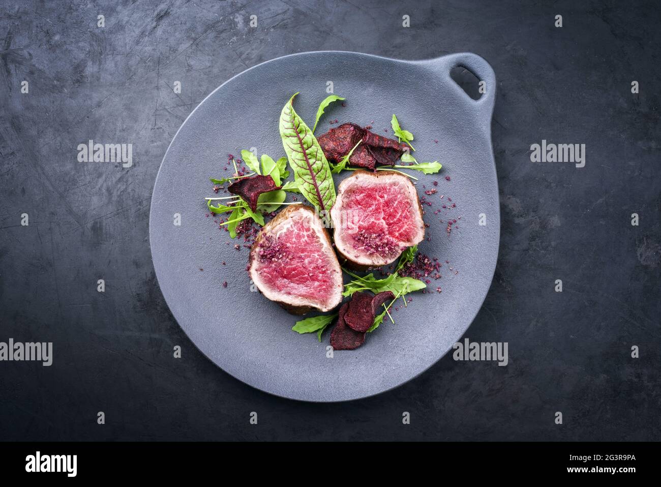 Fried dry aged beef fillet steak natural with potato and vegetable ...