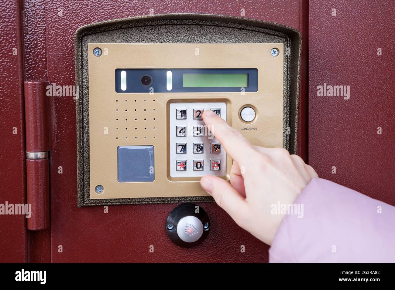 Female finger pushing buttons of intercom, close up view, Caucasian ...