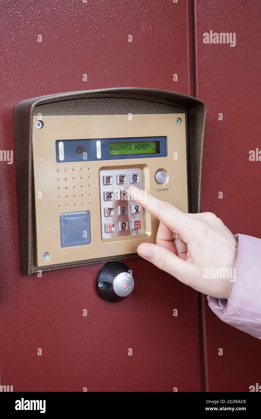 dials the code for a call over the intercom, russian Stock Photo - Alamy