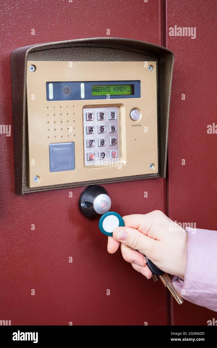 dials the code for a call over the intercom, russian Stock Photo - Alamy