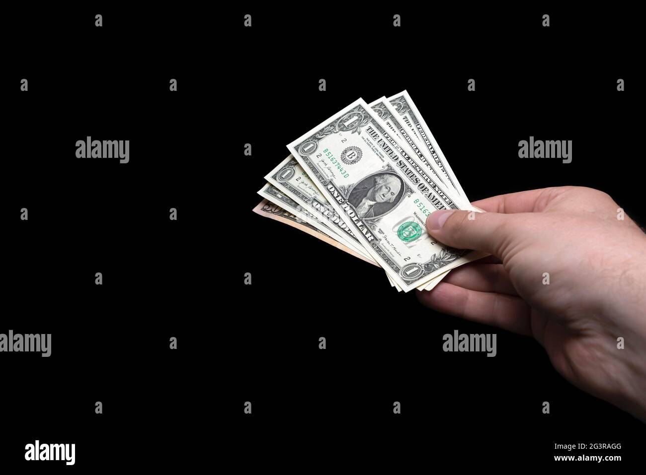 Money in hand, banknote in hand. Hand holding one dollar banknote ...