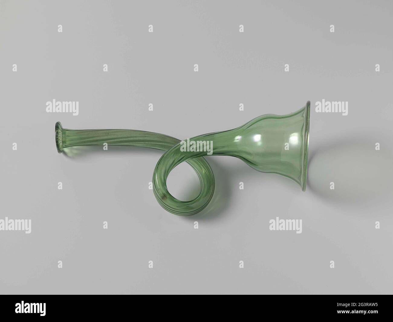 Glass trumpet. Smooth, curved ribbed tube, flared in a bell-shaped ...