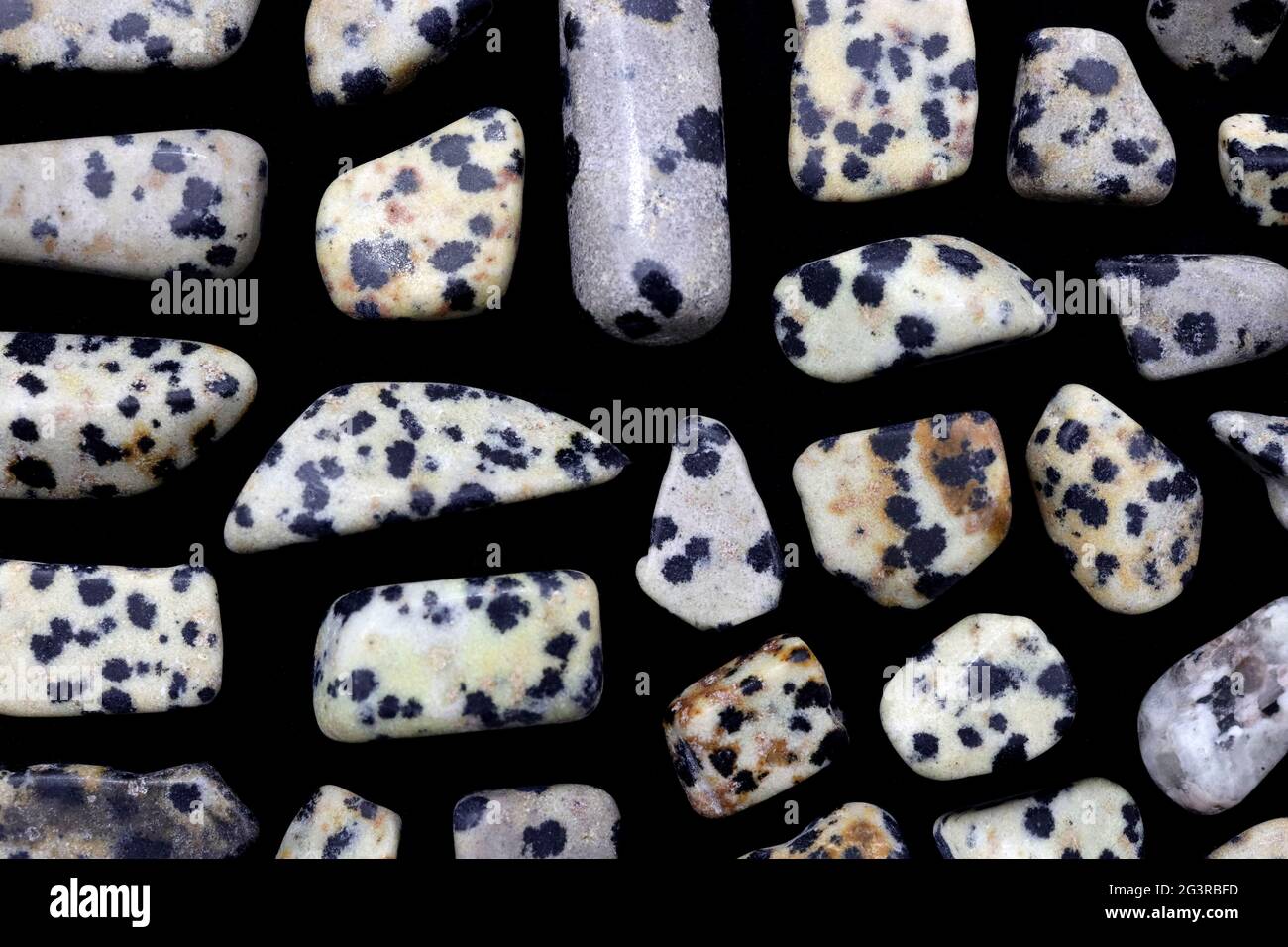 Dalmatian jasper rare jewel stones texture on black background Stock ...