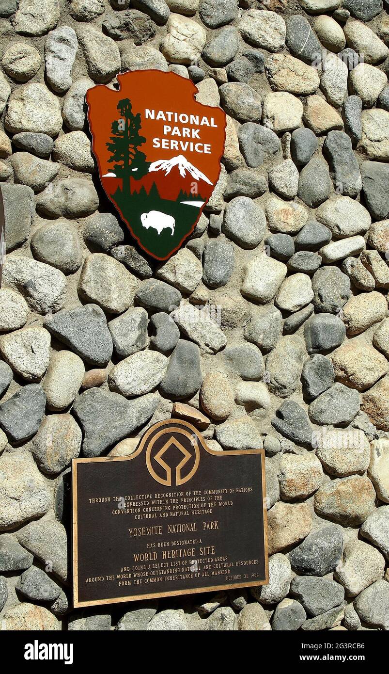 National Park Service sign and World Heritage Site plaque at Yosemite ...