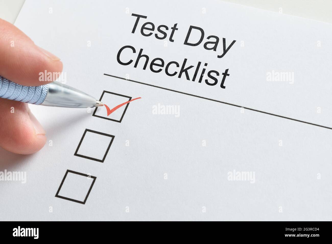 Test Day Planning Checklist. Hand Filling Check List Stock Photo - Alamy