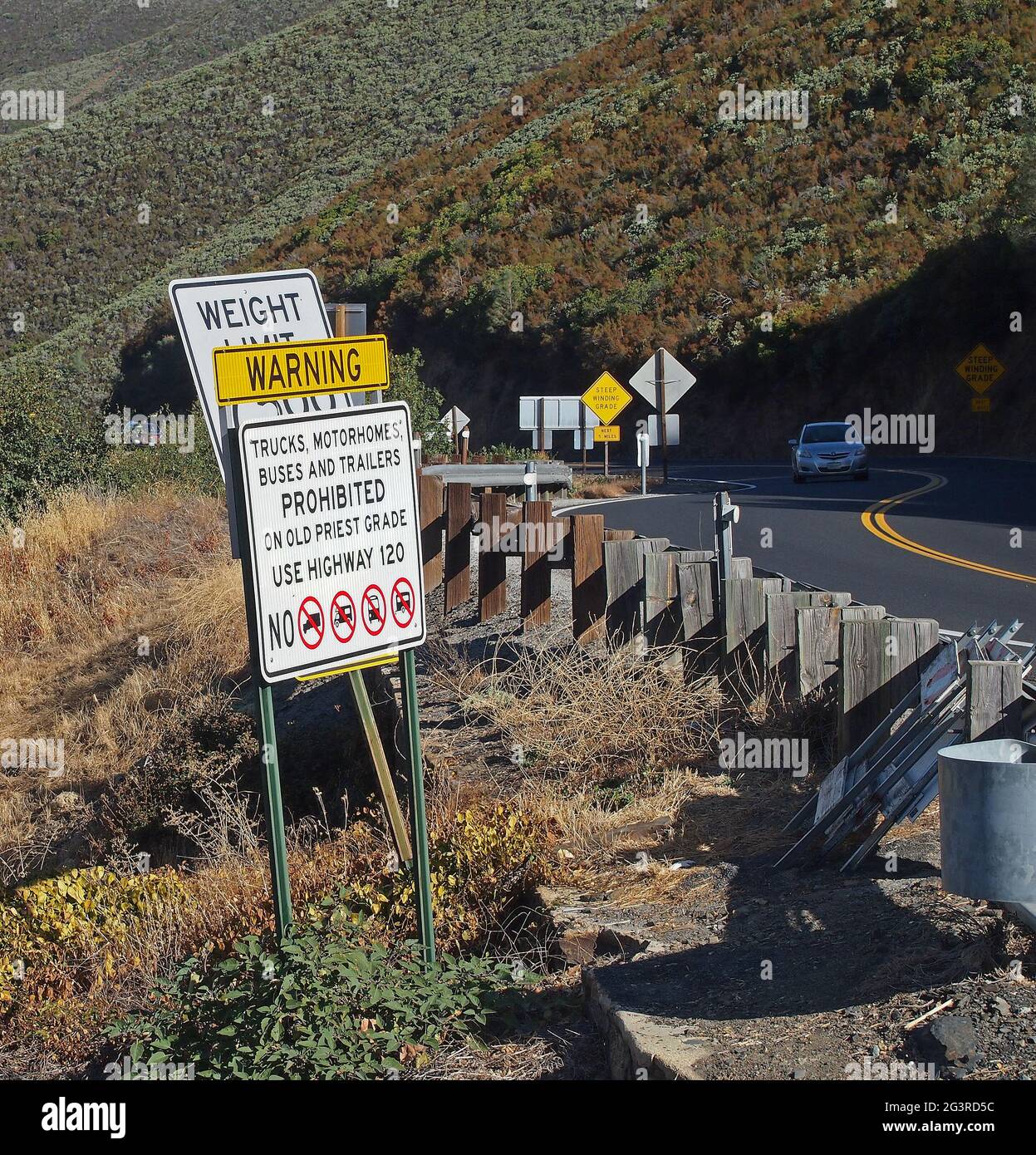 Old Priest Grade warning sign in Tuolumne County, California Stock ...