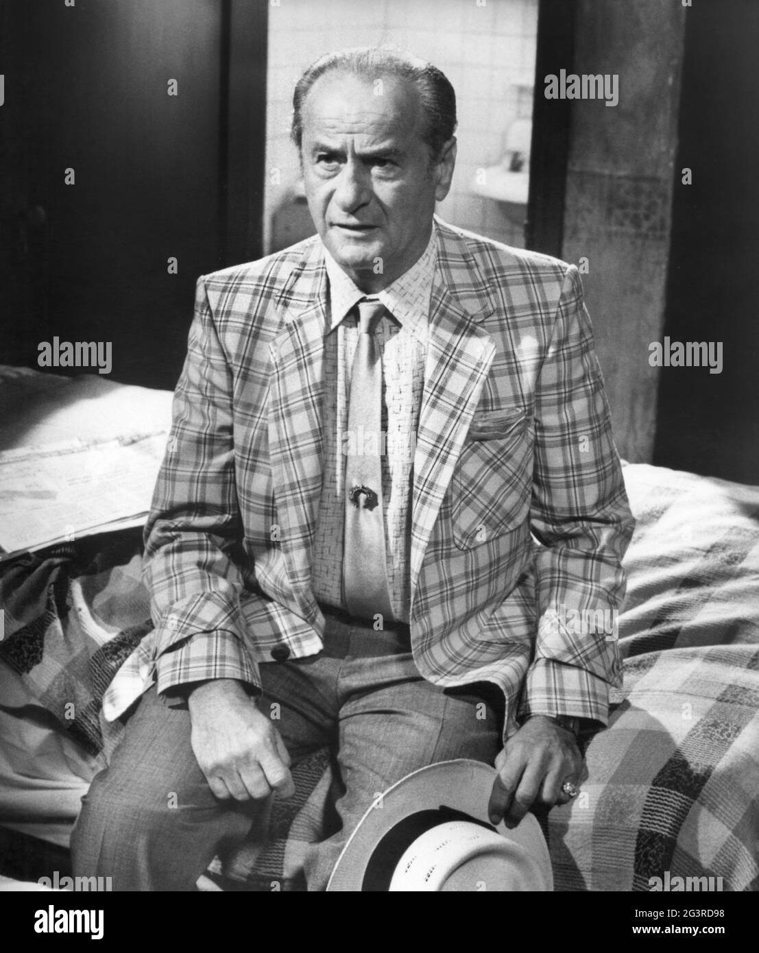 Eli-Wallach, seated Portrait, on-set of the Film, "Winter Kills", AVCO ...