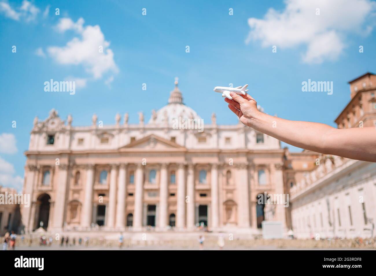 Close up model plane in Vatican city and St. Peter's Basilica church ...