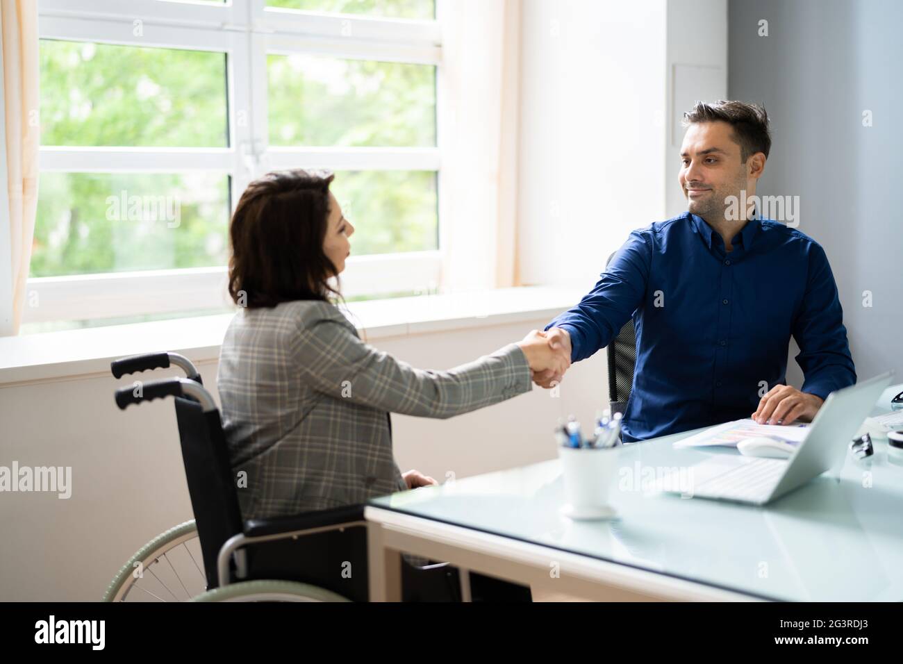 Business handshake standing hi-res stock photography and images - Alamy
